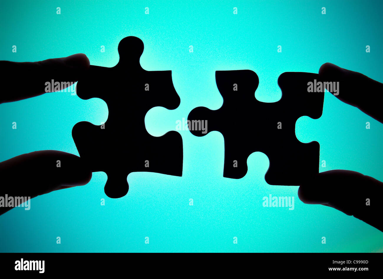 Puzzle pieces fitting together form hi-res stock photography and images ...