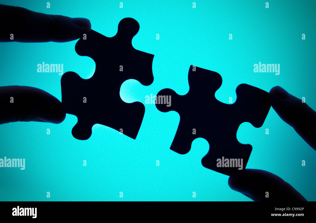 Puzzle pieces fitting together form hi-res stock photography and images ...