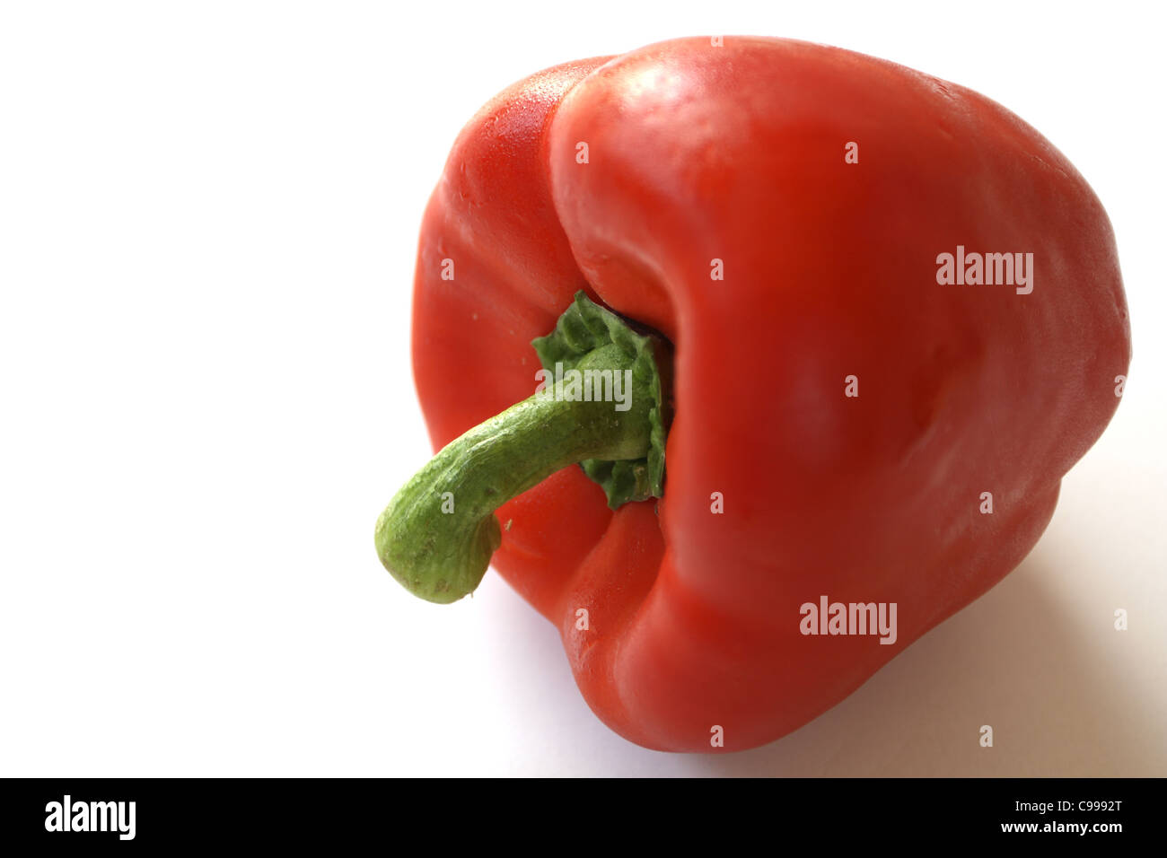 red paprika on the white background Stock Photo - Alamy