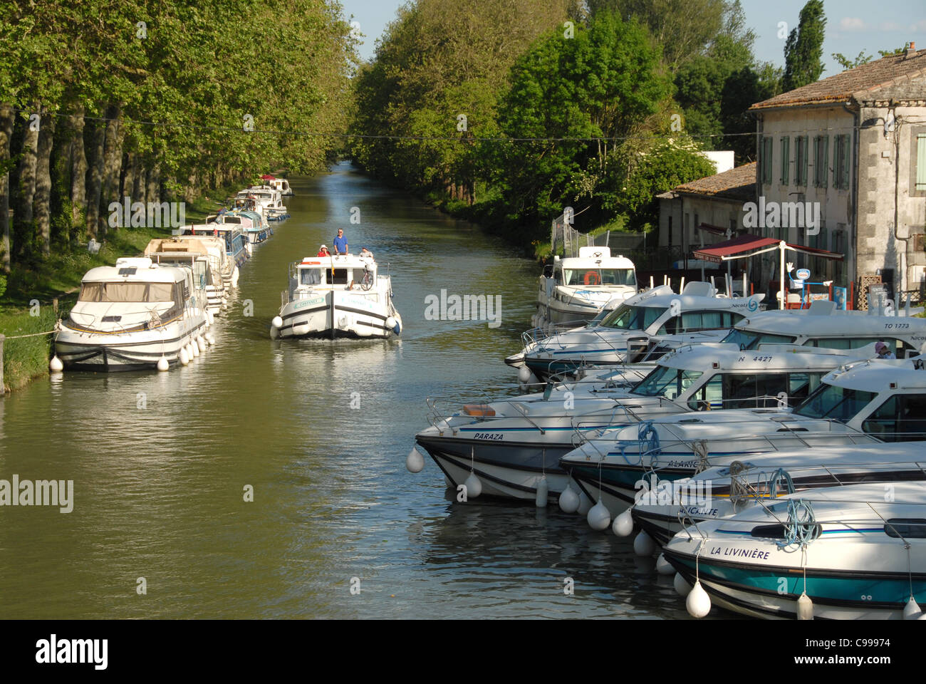 Houseboats at the Port of Bram on the Canal du MIdi in southern France ...