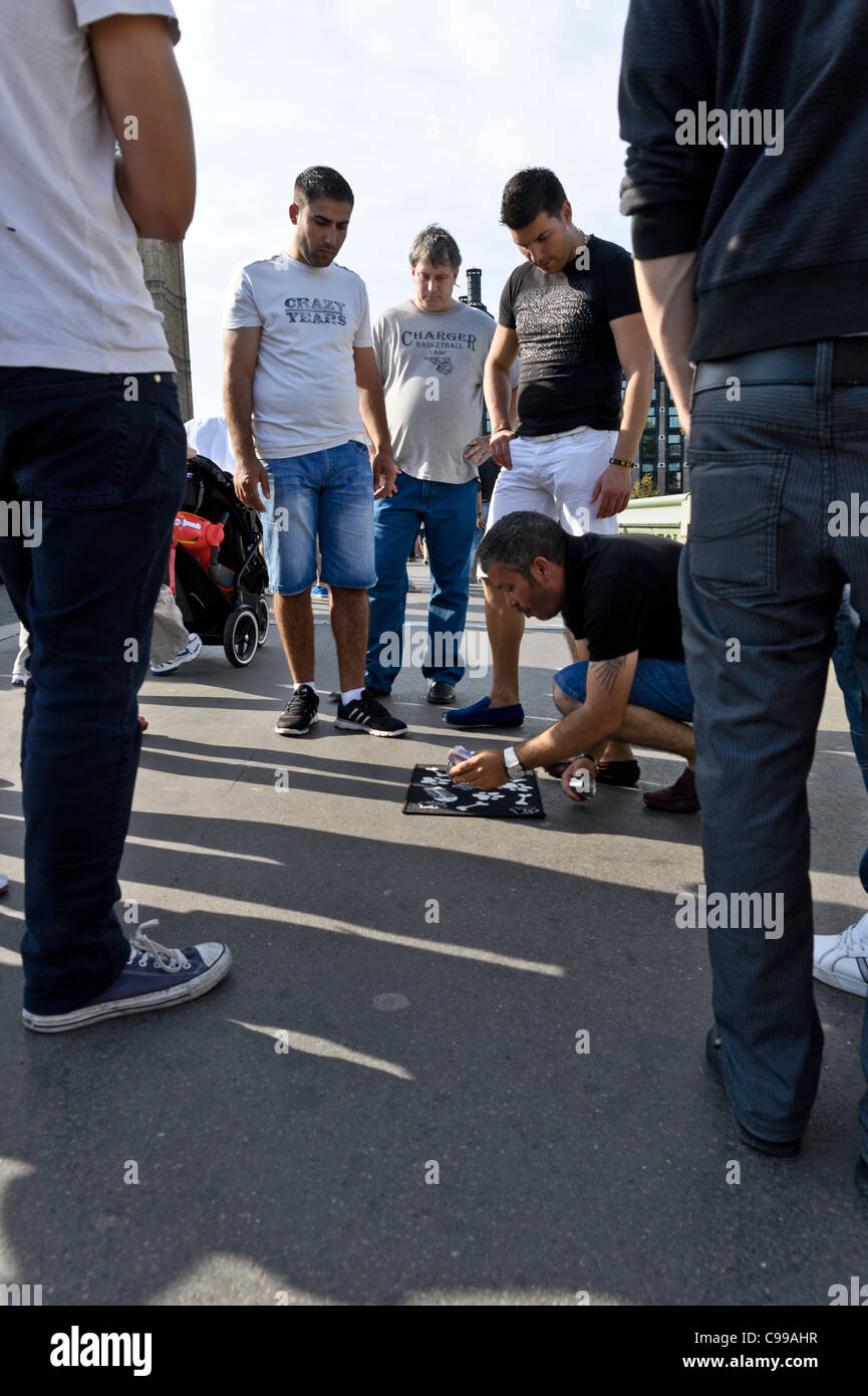Cup and ball guessing game hi-res stock photography and images - Alamy