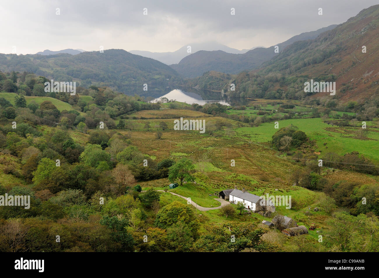 welsh farmhouse and landscape with llynn gwynant lake in the background ...