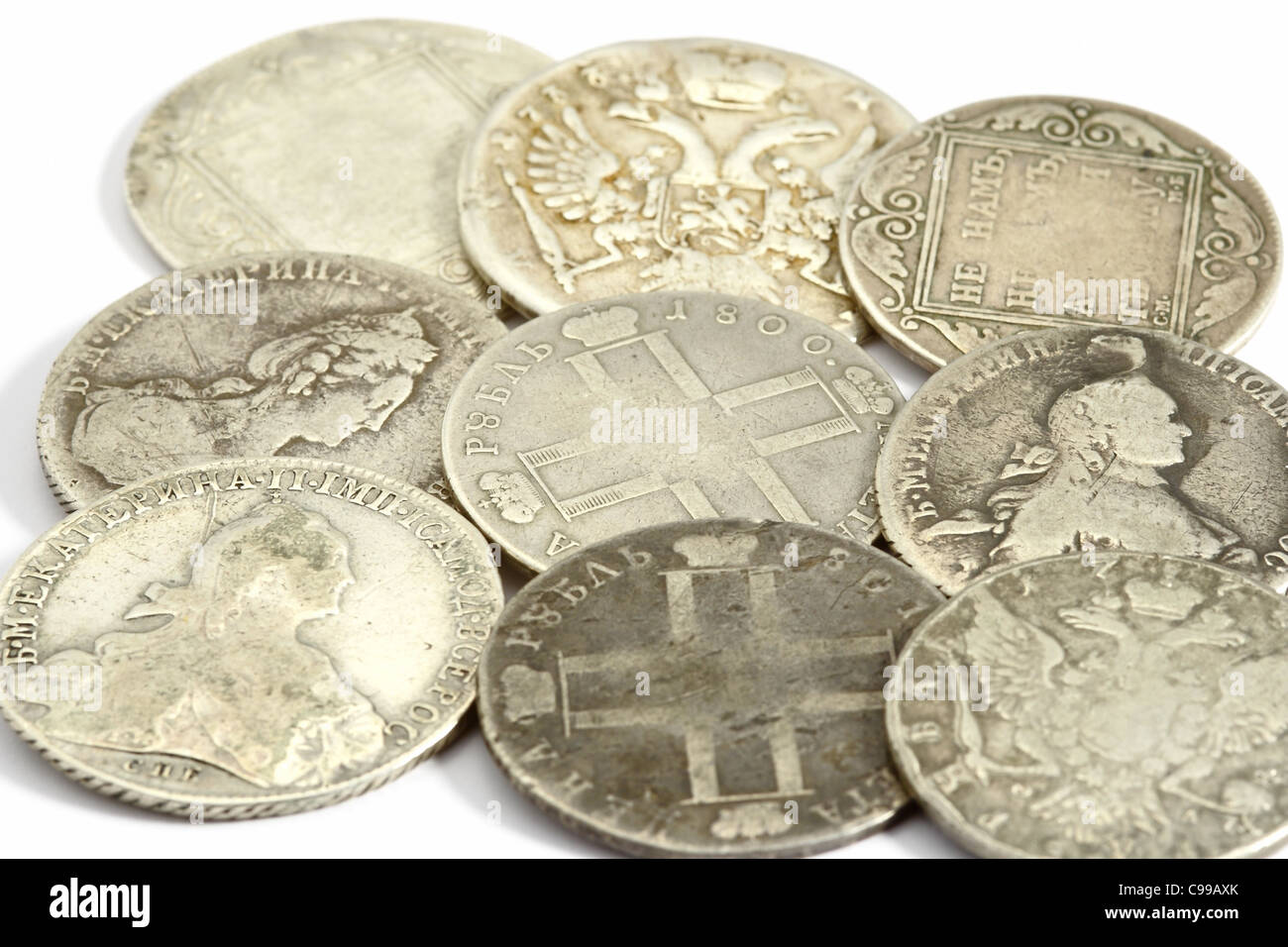 ancient coins on the white background Stock Photo - Alamy