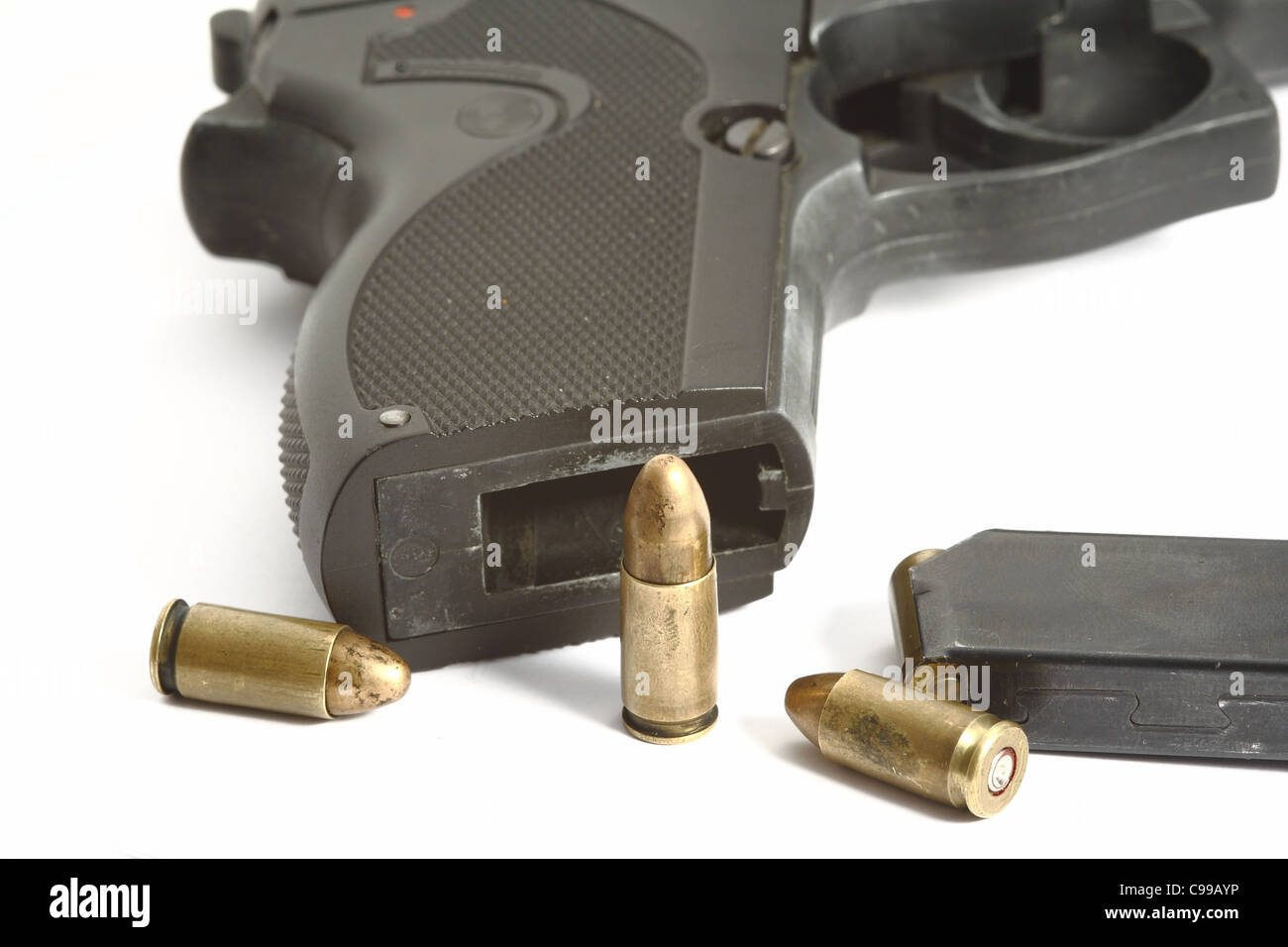 bullet and gun on the white background Stock Photo - Alamy