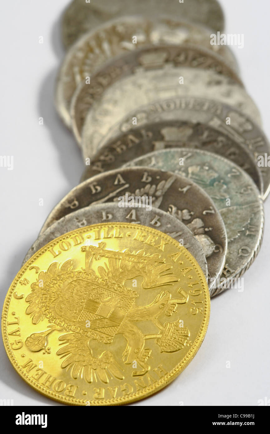 ancient coins on the white background Stock Photo - Alamy