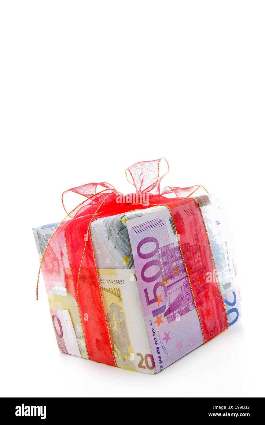 Different euro bills packed as a present isolated on a white background ...