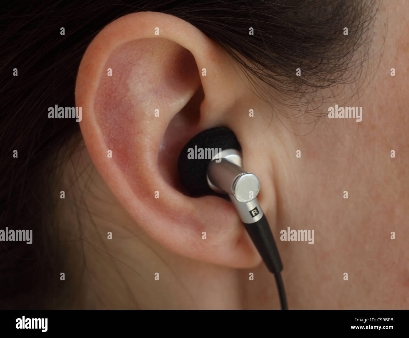 Earlobe plug hi-res stock photography and images - Alamy