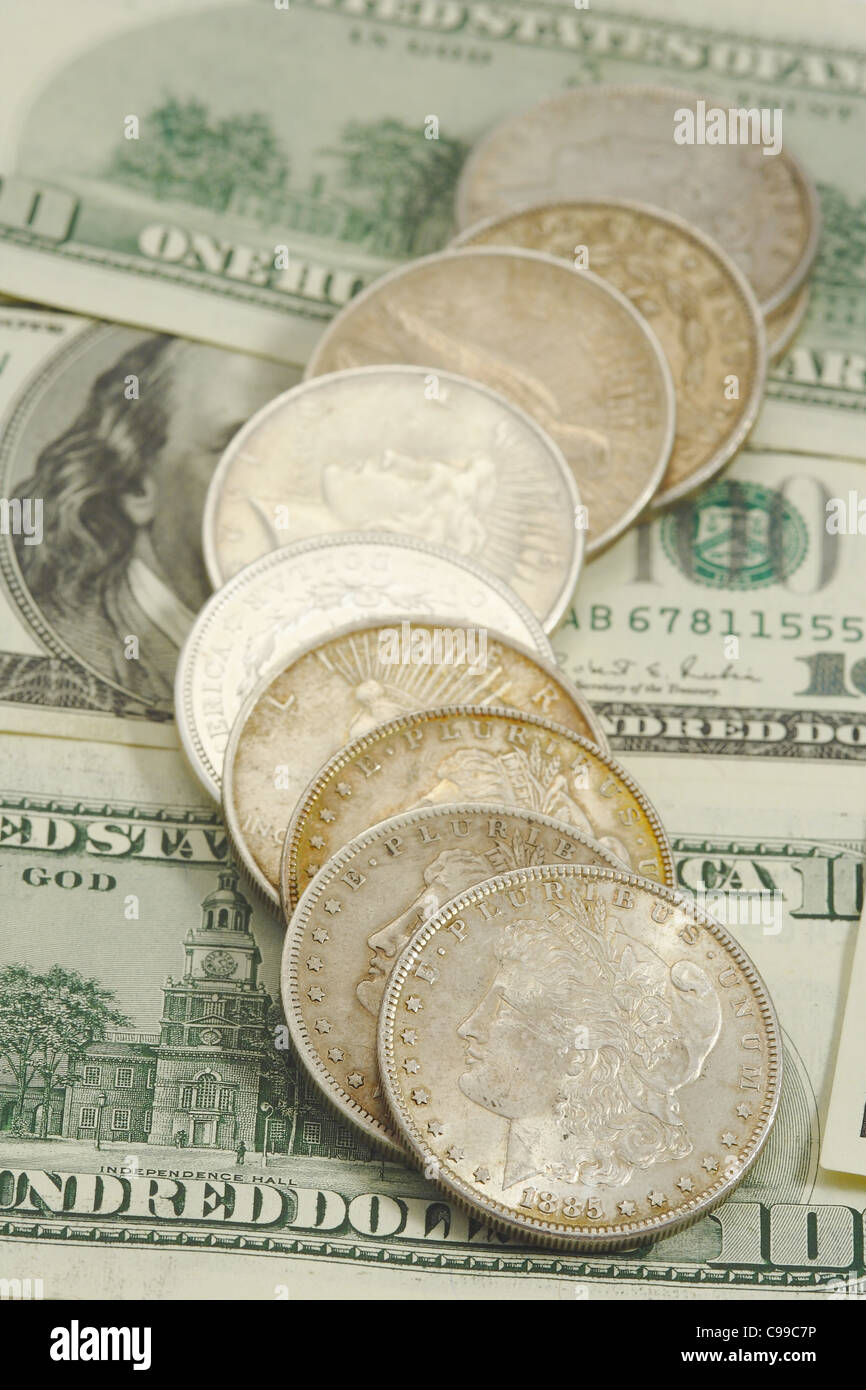 silver trade dollar on the dollar background Stock Photo - Alamy