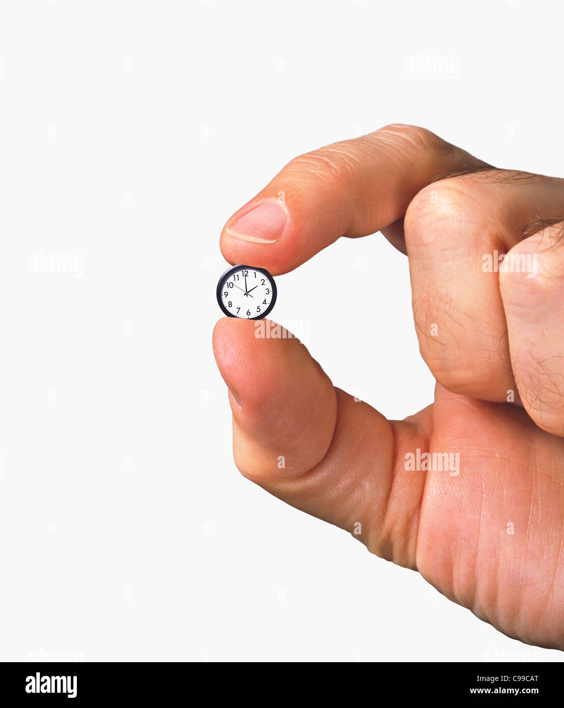close-up of hand with tiny clock Stock Photo - Alamy