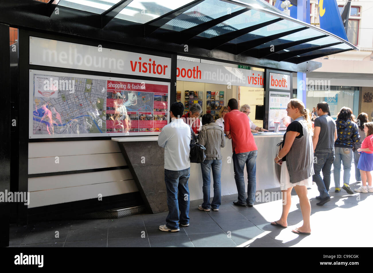 Tourists at the Tourist Information Centre kiosk in Bourke Street in ...