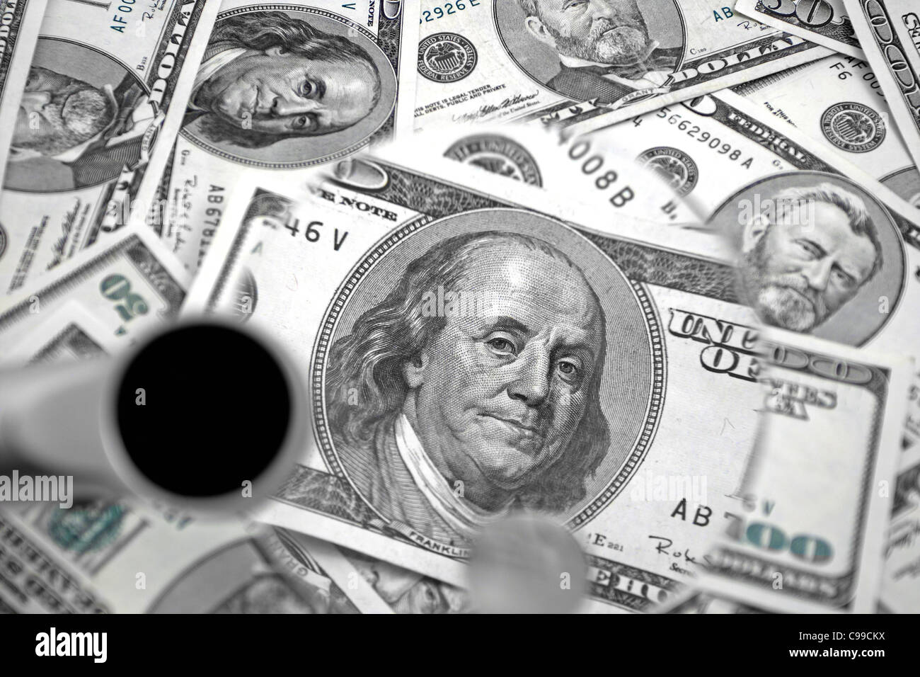 magnifying glass and money observation with magnifying glass Stock ...