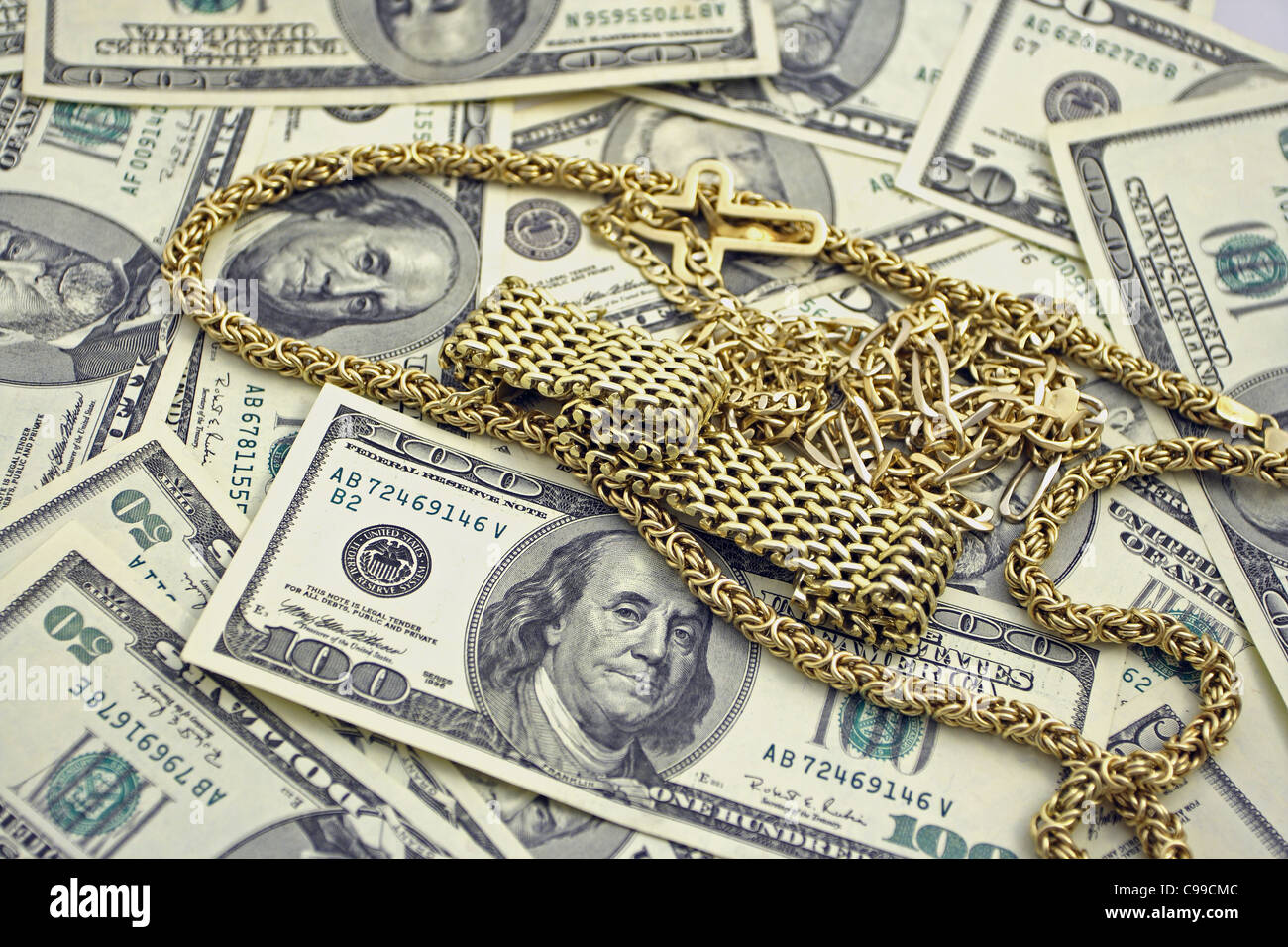 money dollar and gold Stock Photo - Alamy