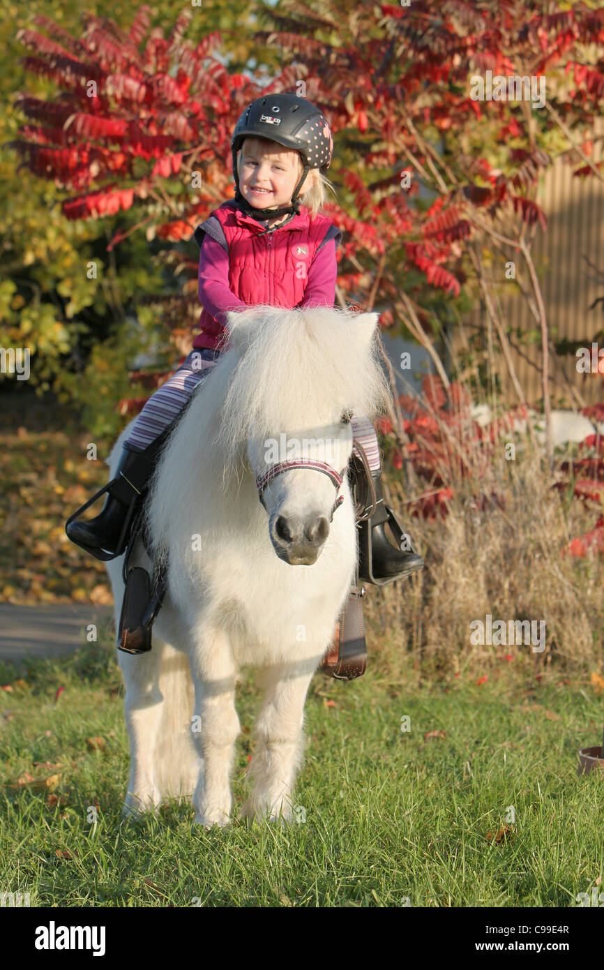girl riding on Shetland Pony Stock Photo - Alamy