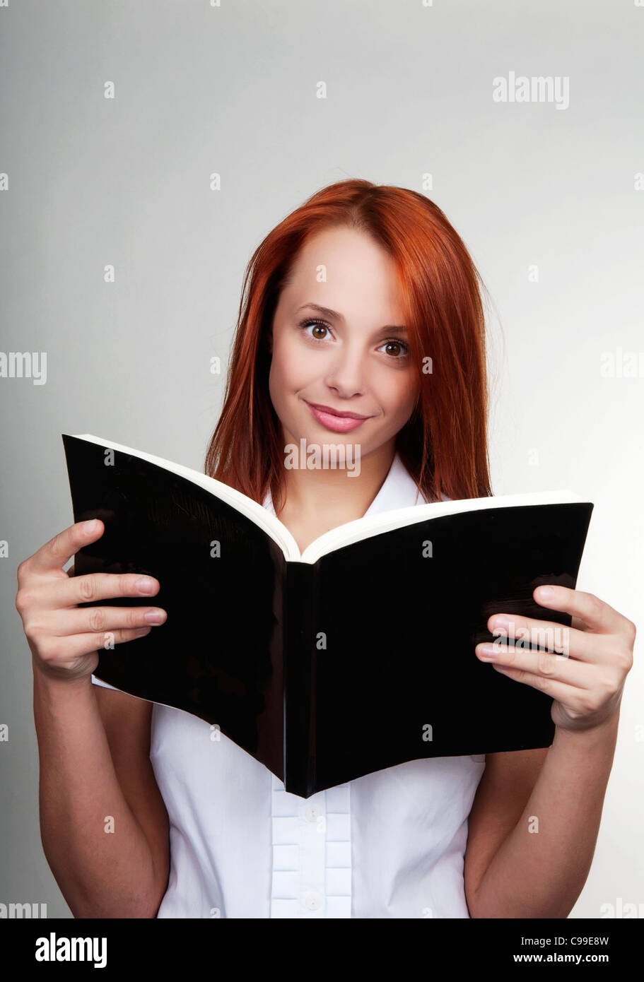 Female reading large book hi-res stock photography and images - Alamy