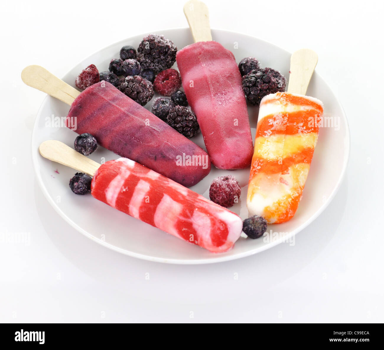 colorful ice cream pops with frozen berries Stock Photo - Alamy