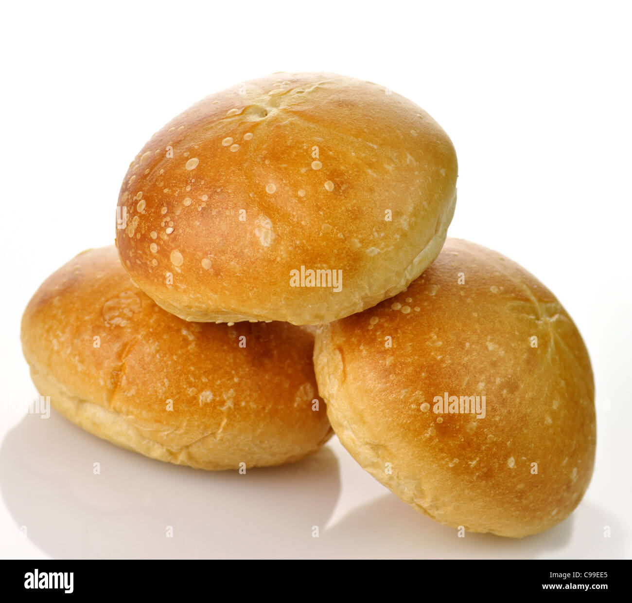 a stack of fresh breakfast rolls on a white background Stock Photo - Alamy