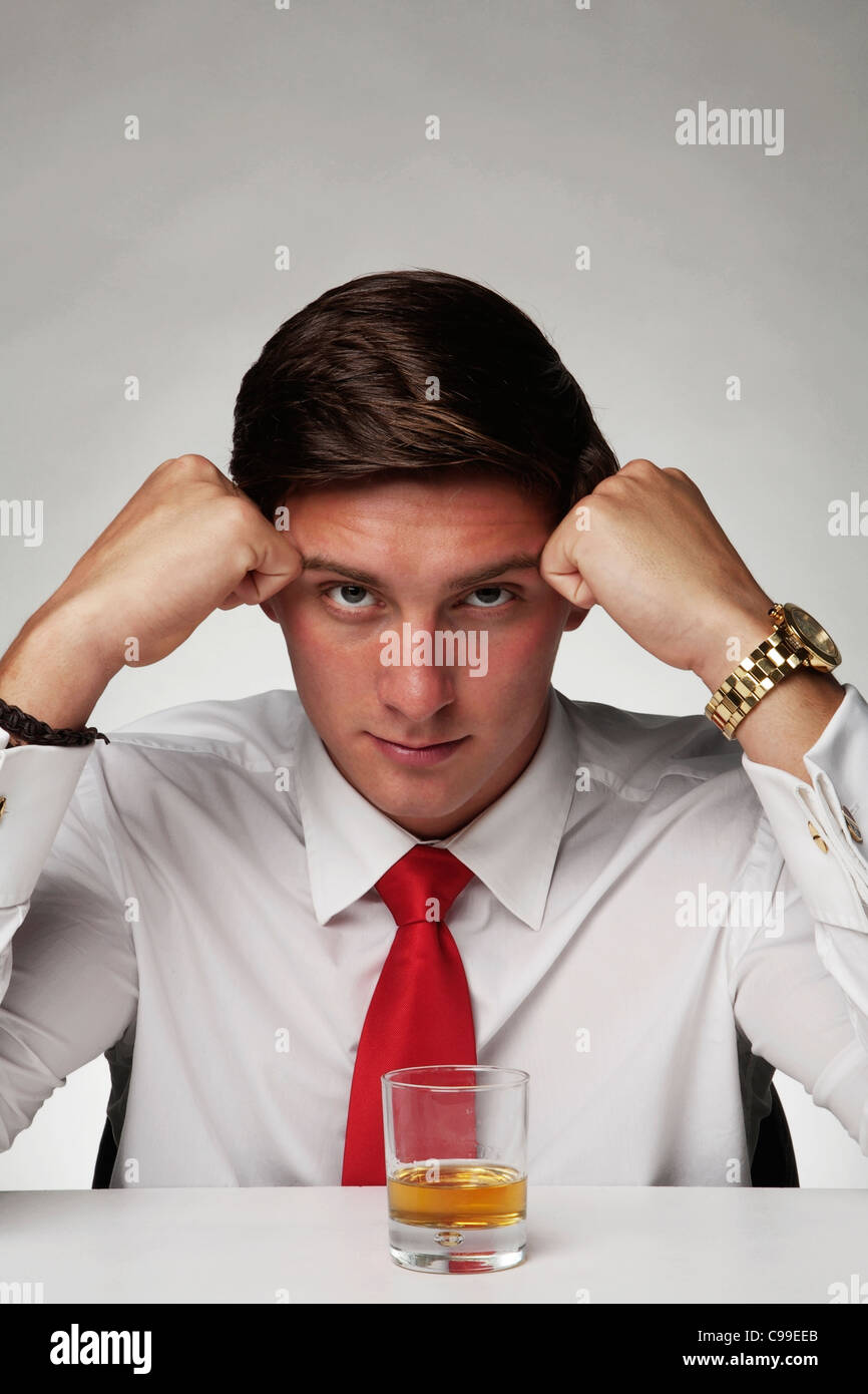 businessman having a drink at work Stock Photo - Alamy