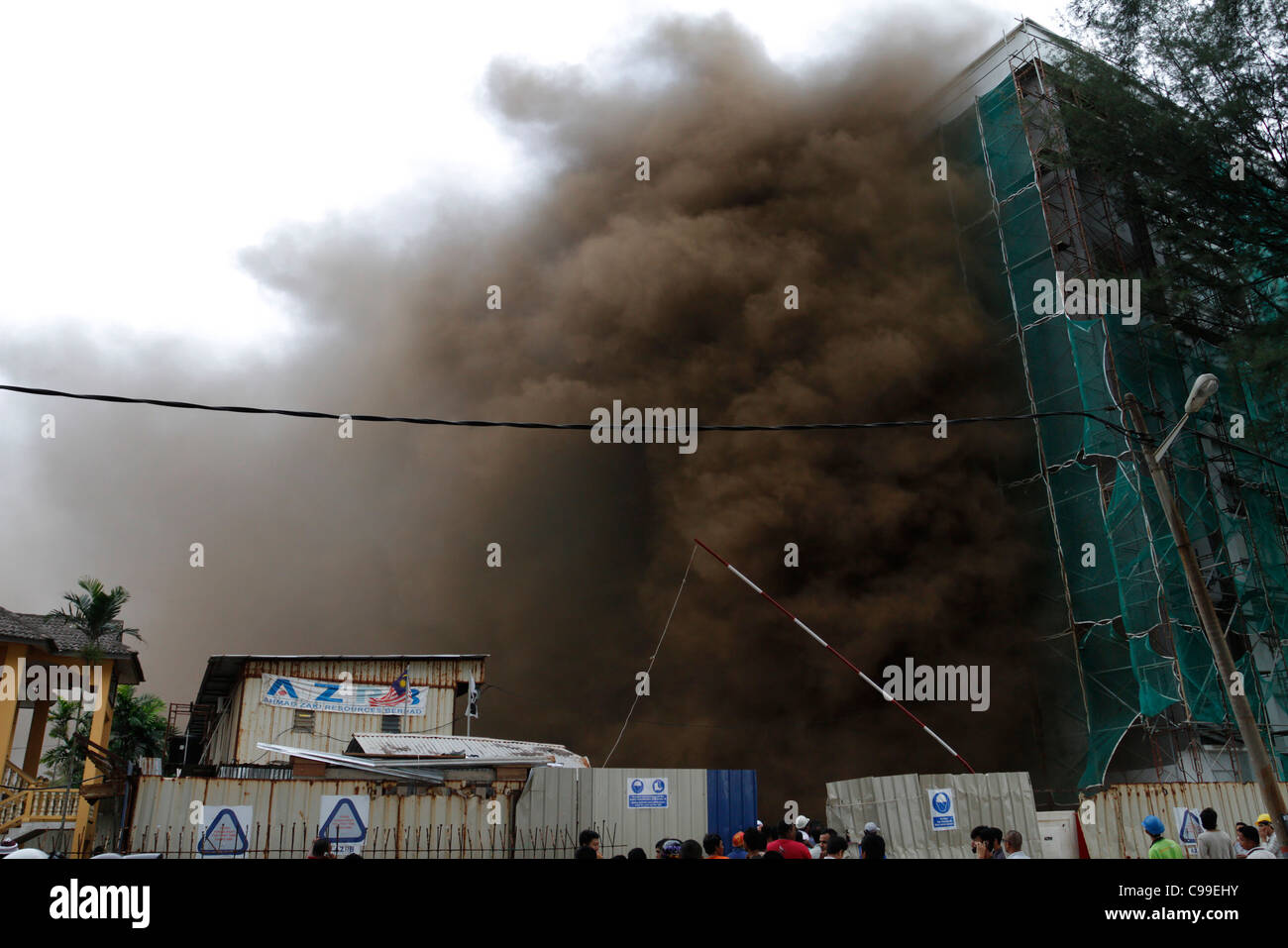 A building under construction on fire in Malaysia Stock Photo - Alamy