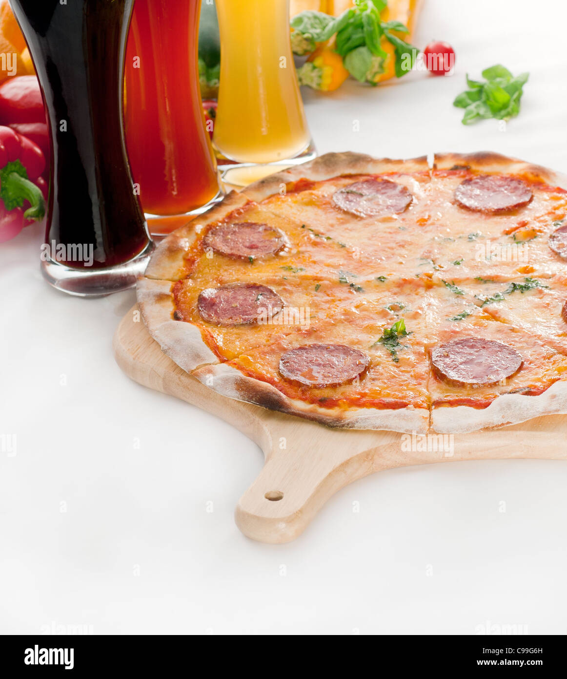 Italian original thin crust pepperoni pizza with selection of beers and ...