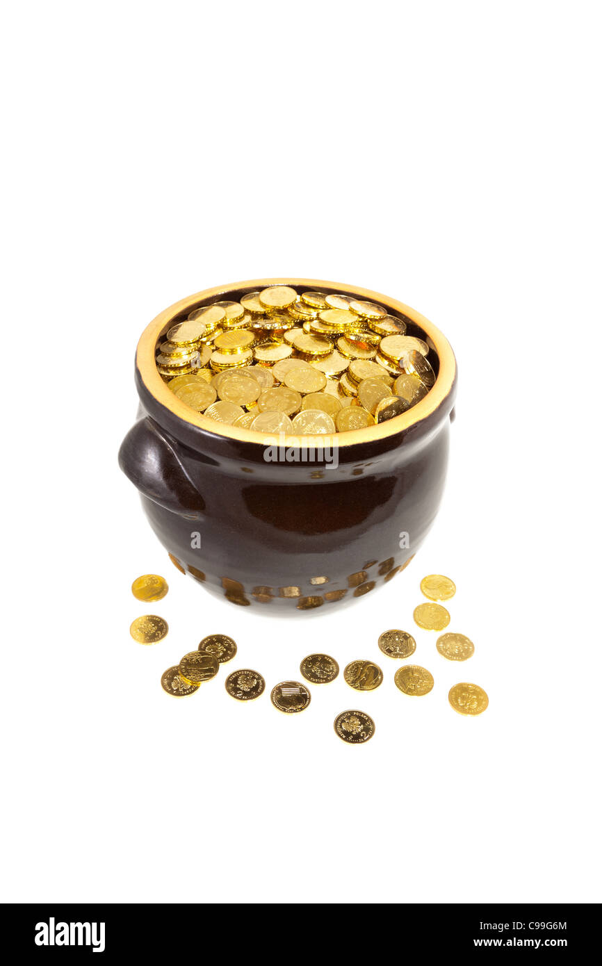 Pot of gold coins isolate on a white background Stock Photo - Alamy