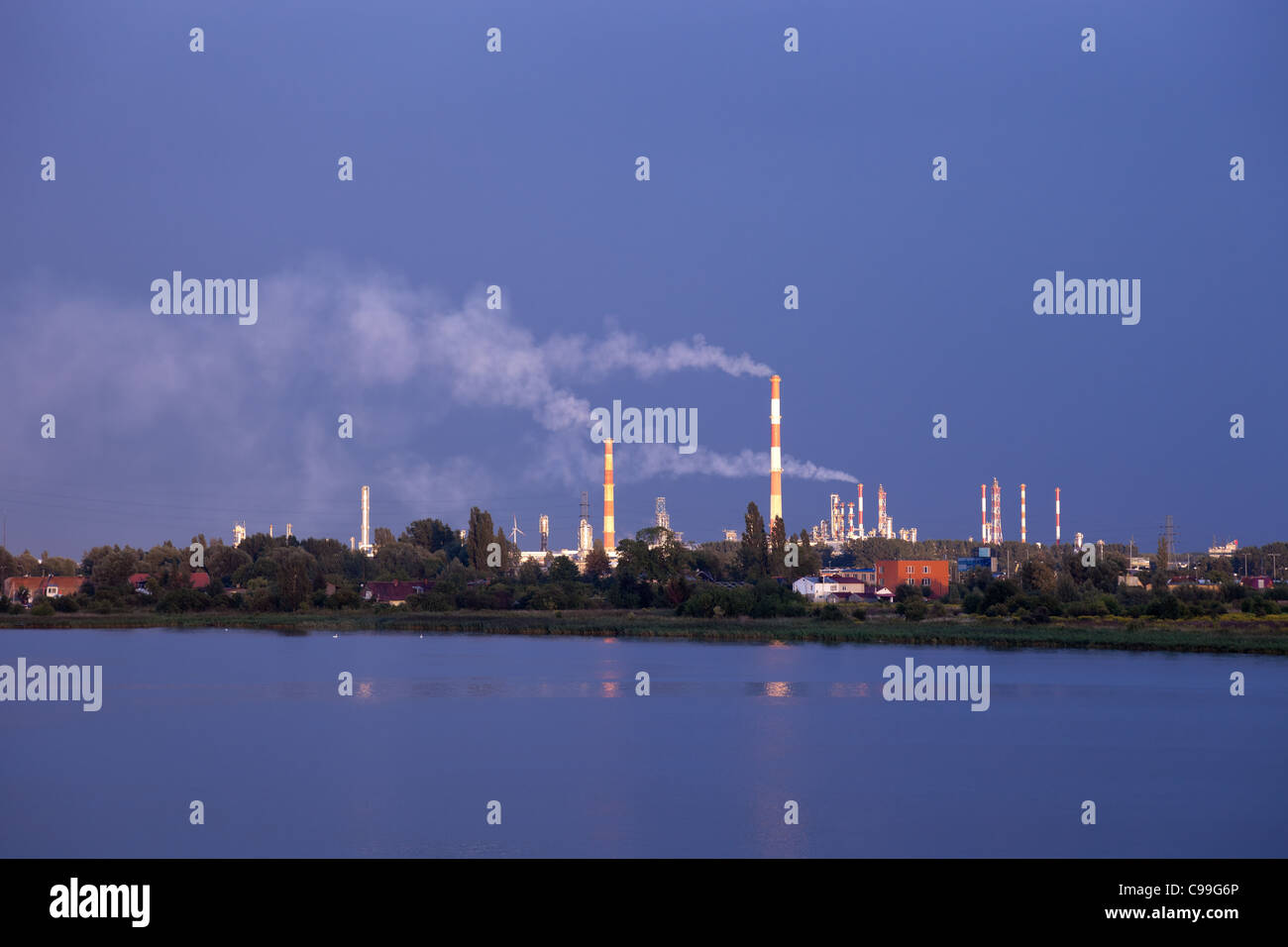 Heavy Heavy storm clouds over the refinery. Gdansk, Poland. clouds over ...