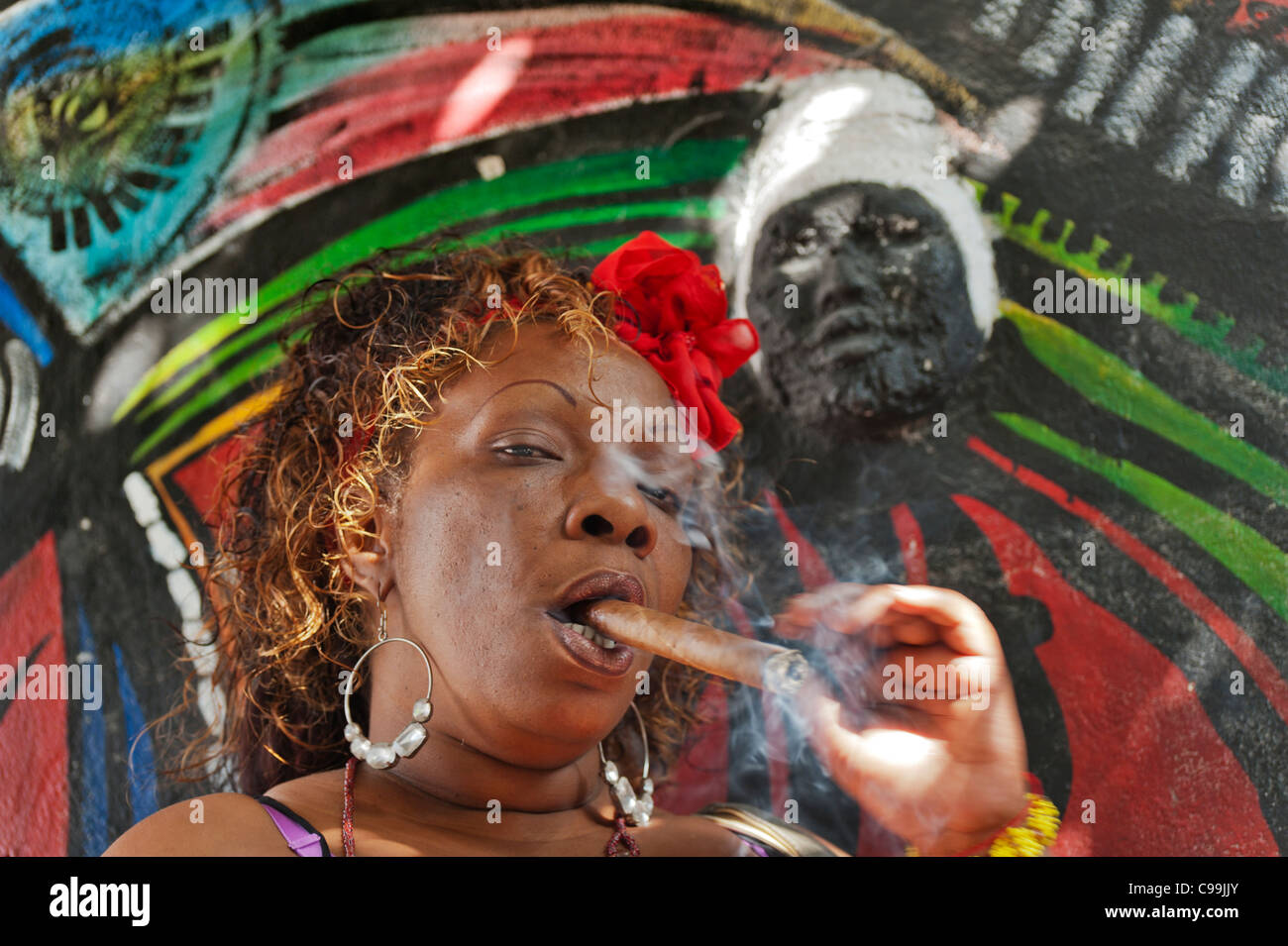 Cuban woman smoking a cigar hi-res stock photography and images - Alamy