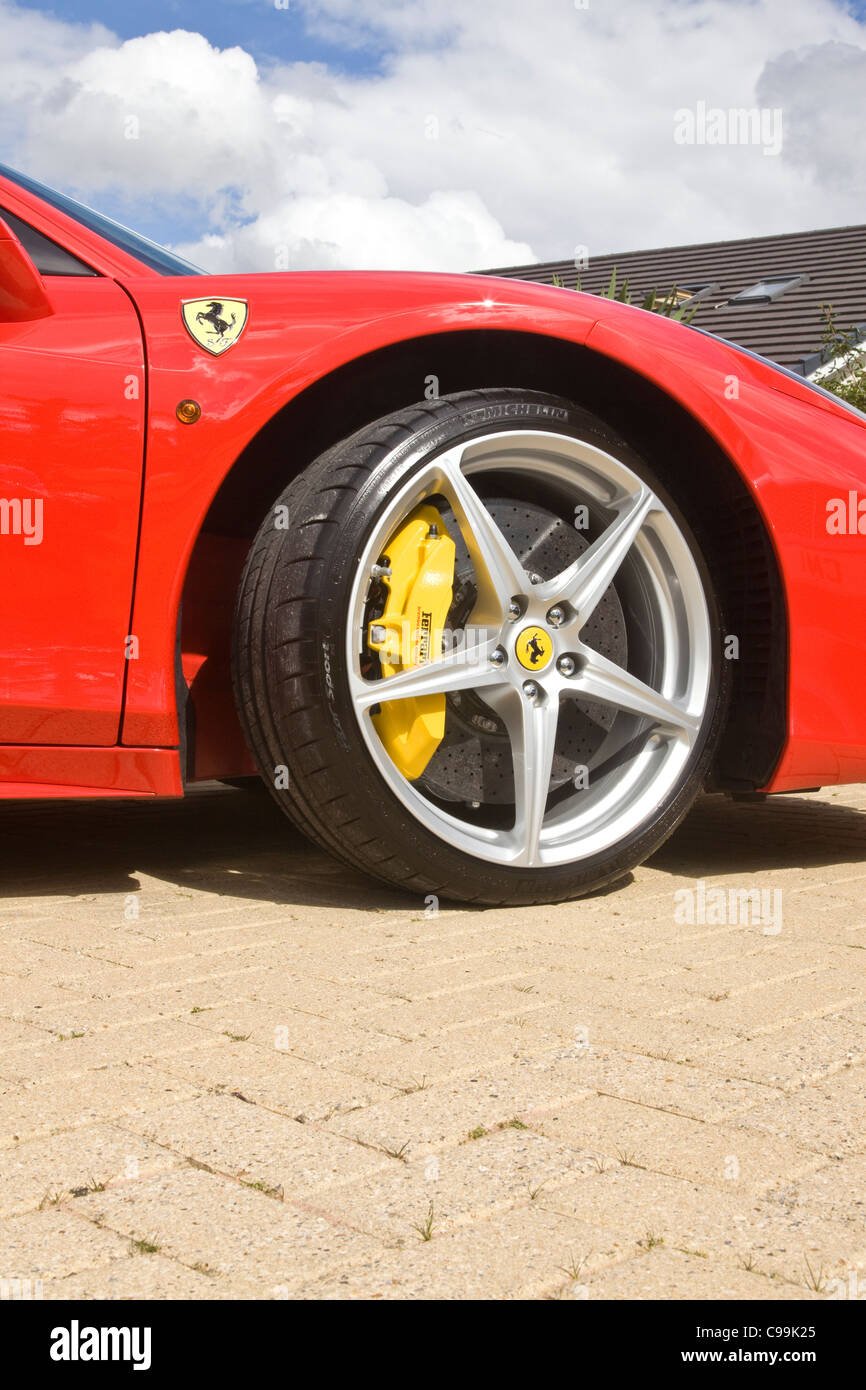 Alloy wheel and brake caliper of Ferrari 458 Italia Stock Photo - Alamy