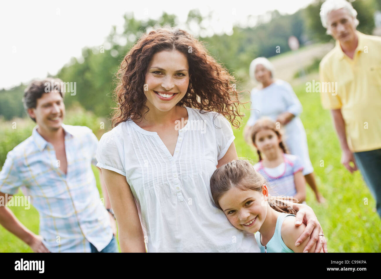 Germany, Bavaria, Family together having picnic, smiling Stock Photo ...