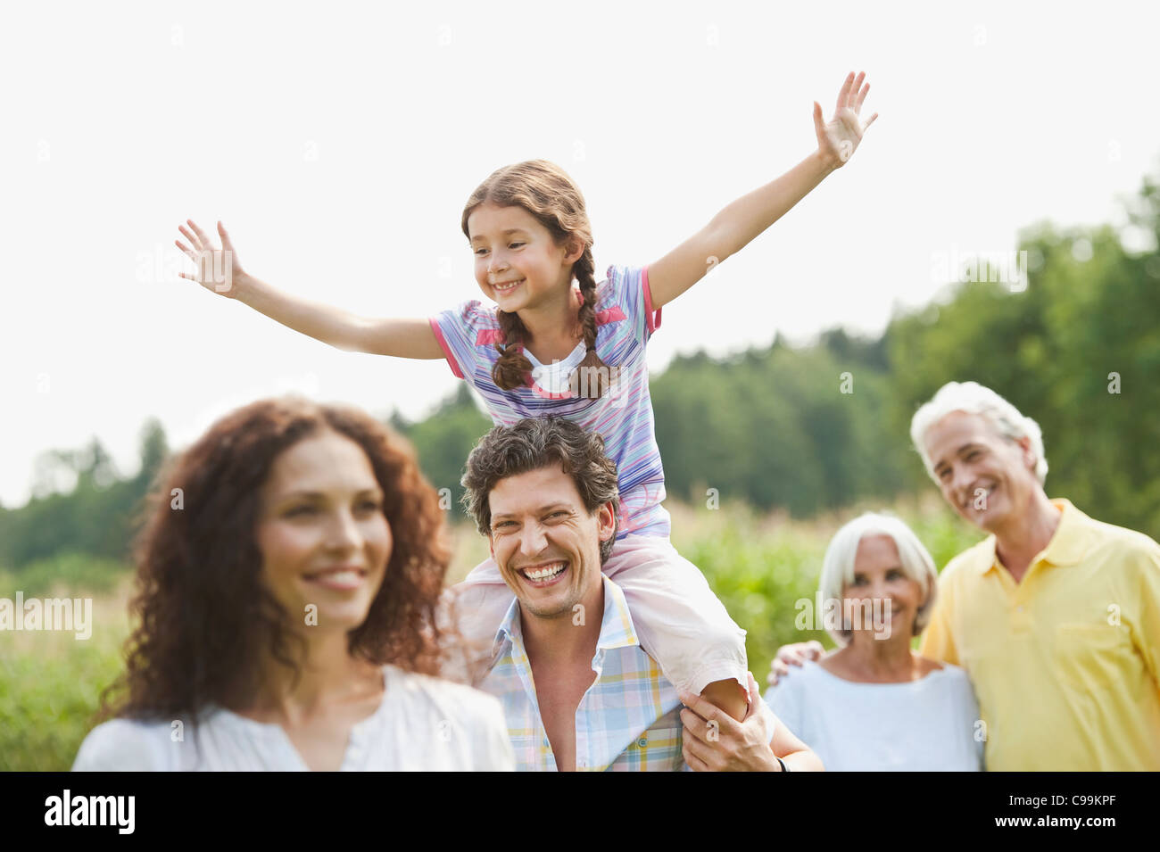 Germany, Bavaria, Family together having picnic, smiling Stock Photo ...