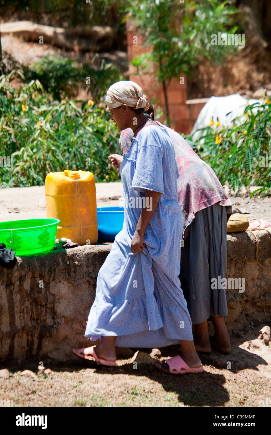 Ethiopian women washing clothes in hi-res stock photography and images ...