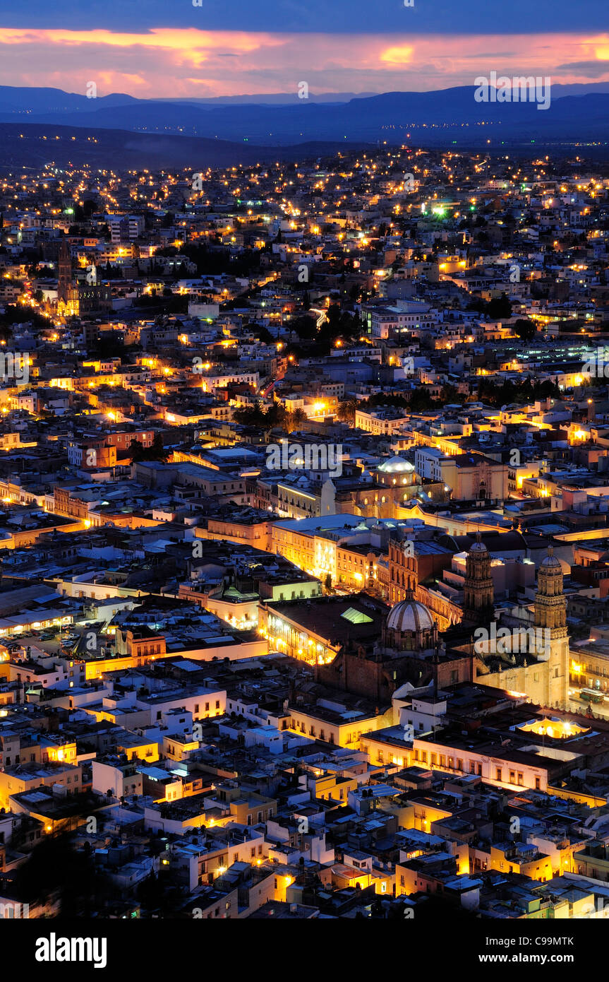 Mexico, Bajio, Zacatecas, Night view of the illuminated city from Cerro ...