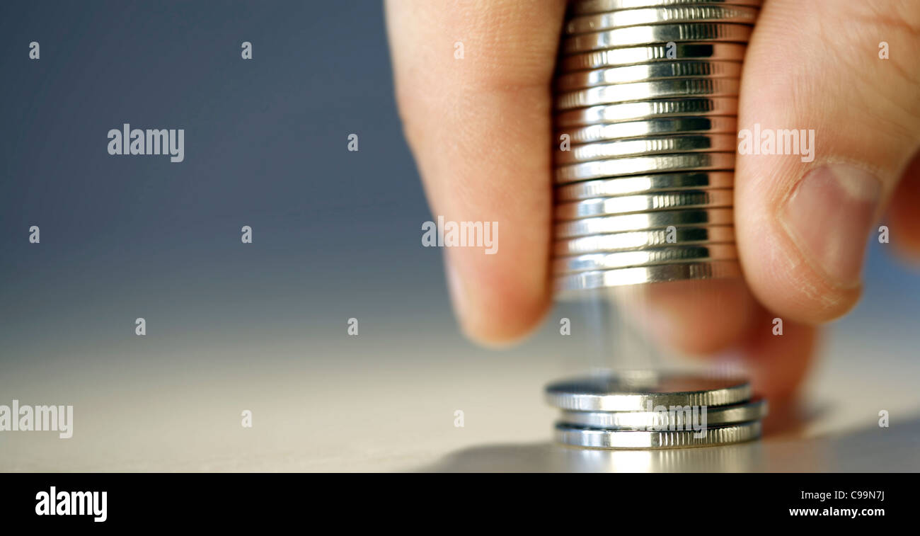 Big tower of money - progressive increase Stock Photo - Alamy