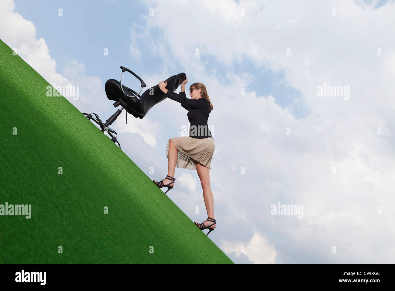 Young Woman Pushing Chair High Resolution Stock Photography and Images ...