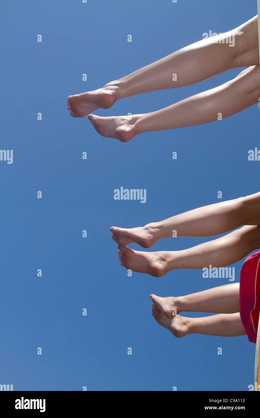 Women legs dangling hi-res stock photography and images - Alamy