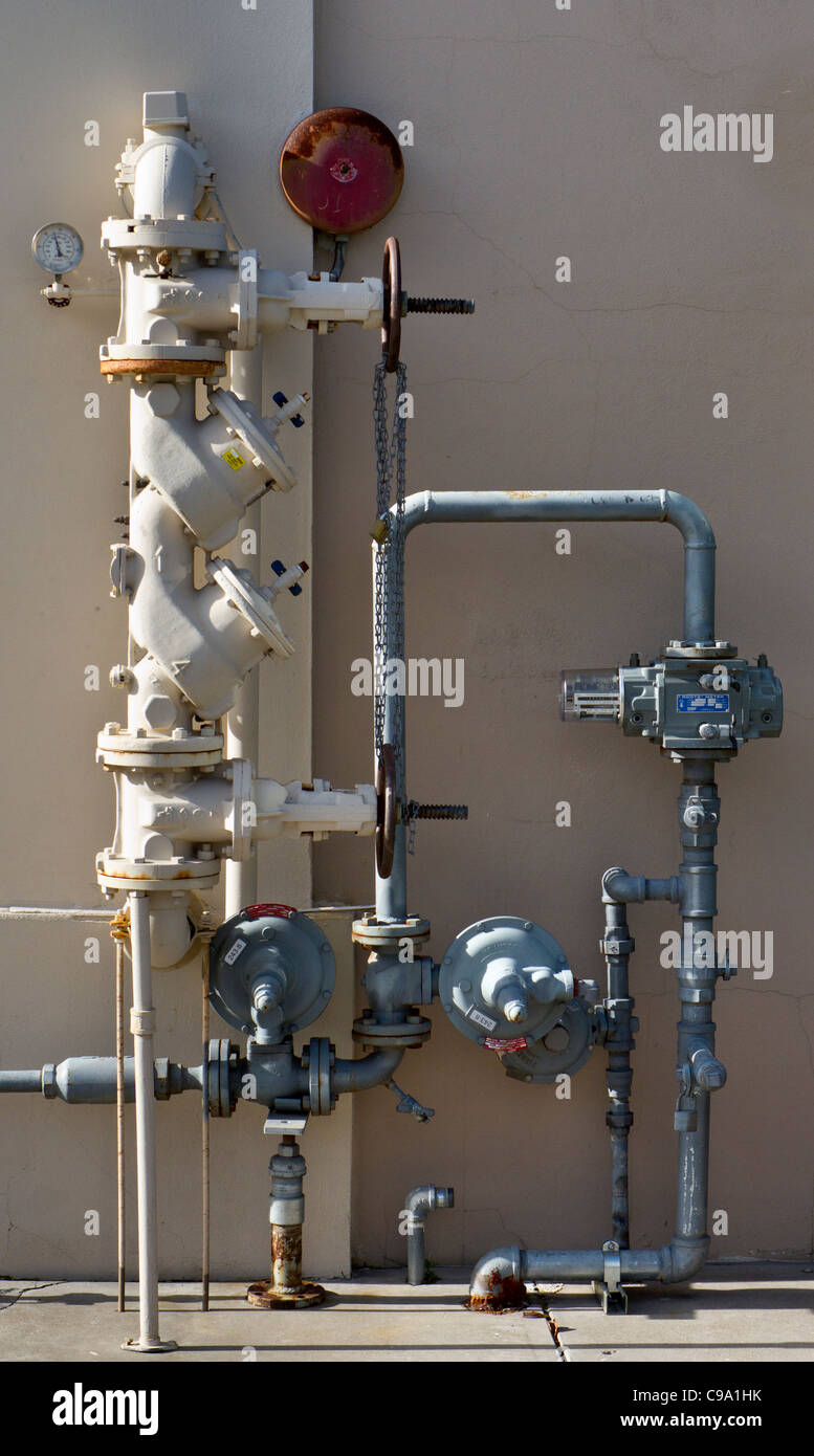 Red, white and grey (gray?) pipes outside a building in San Fransicsco ...