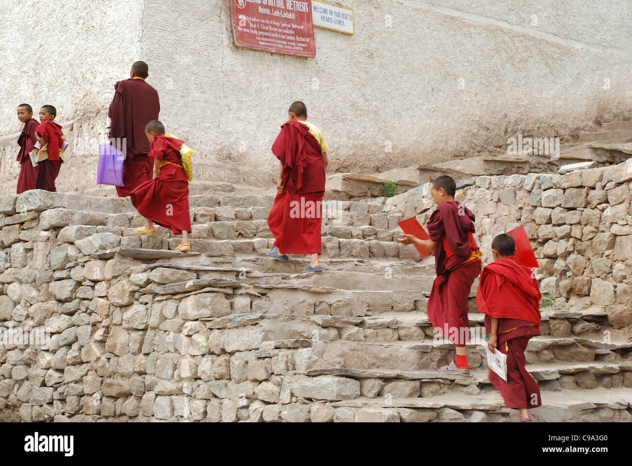 Young Lamas climbing the steps of Hemis Gompa (Monestery) is a Tibetan ...