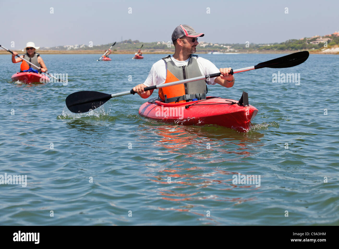 Woman riding canoe in sea hi-res stock photography and images - Alamy