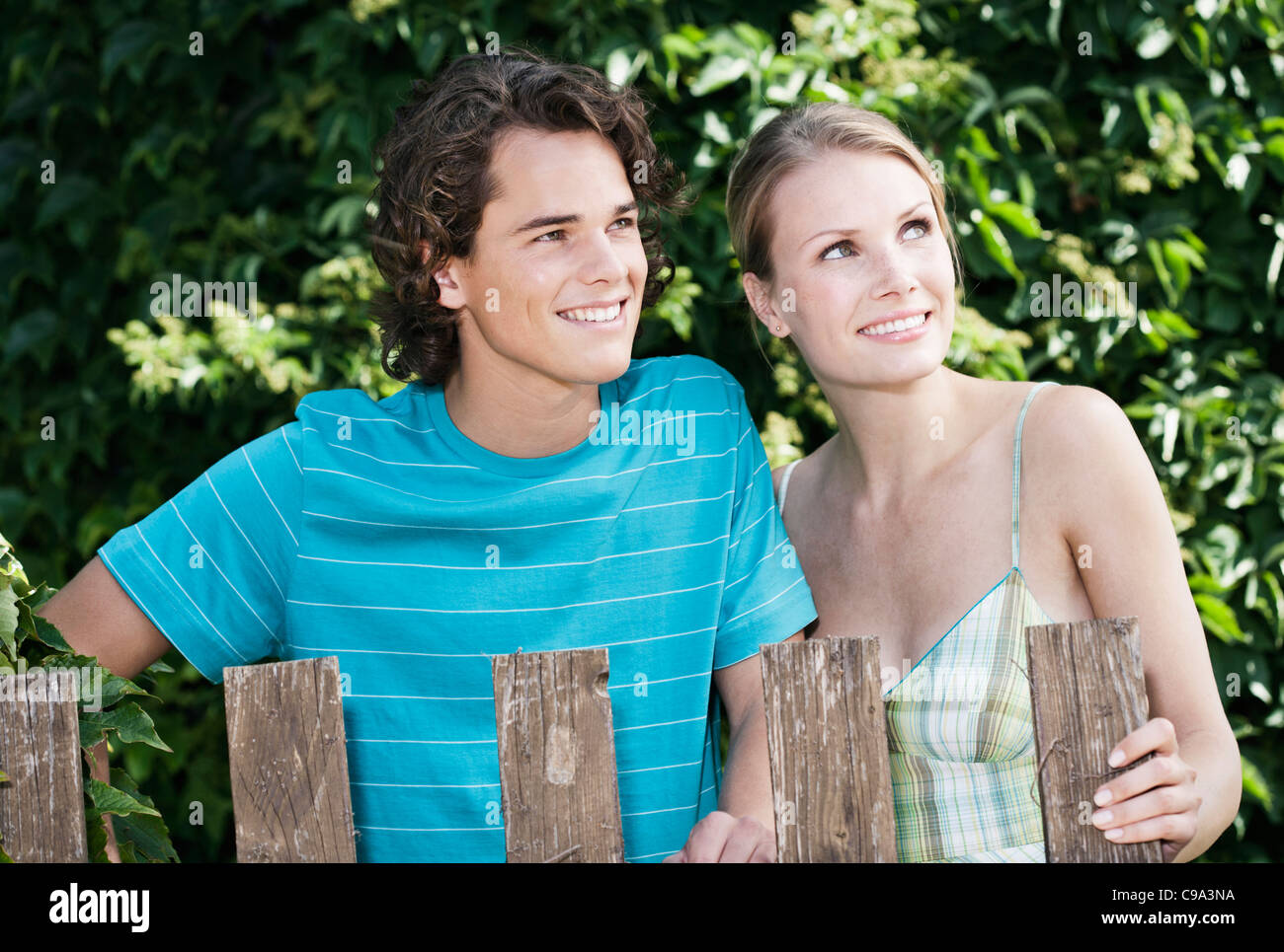 Standing behind wood fence hi-res stock photography and images - Alamy