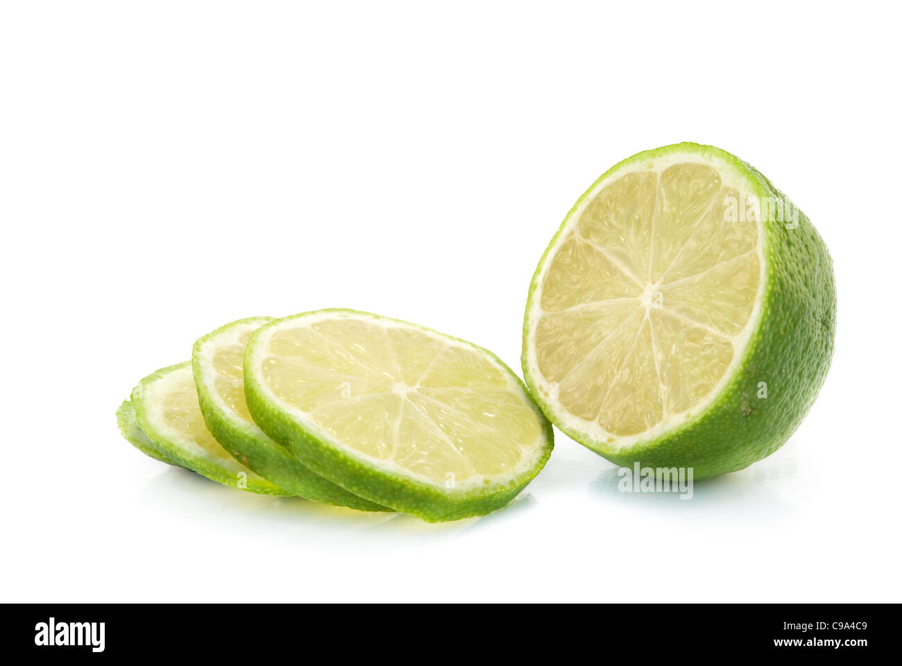single slice of lime on a white background Stock Photo - Alamy