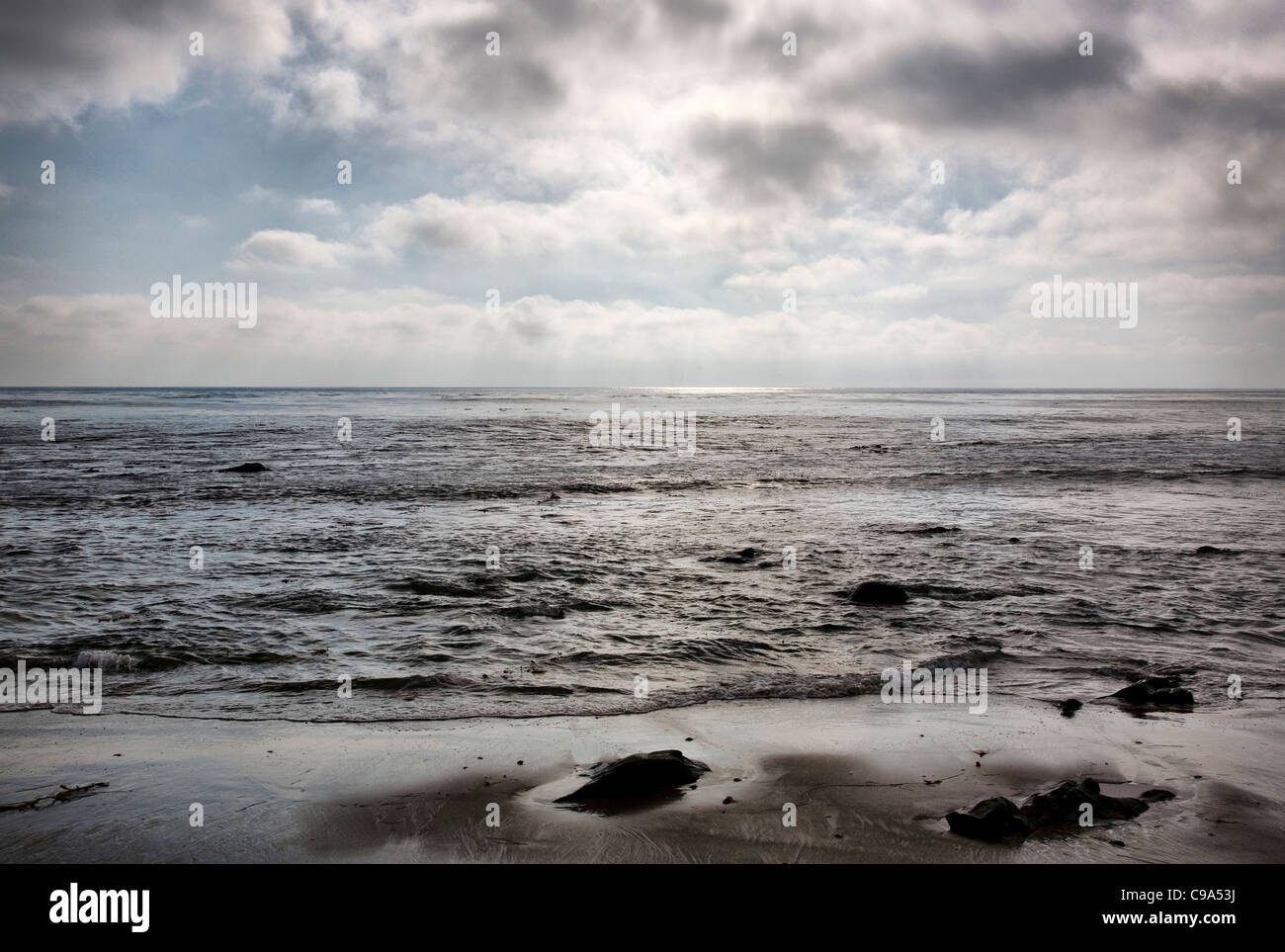 Beach and sea on grey day in Laguna Beach Stock Photo - Alamy