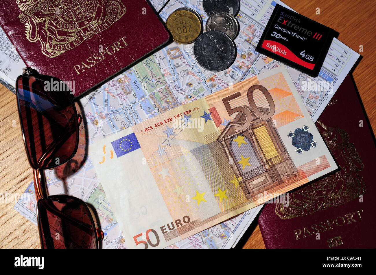 Contents of a British tourist's pockets abroad in Europe, passport, map ...