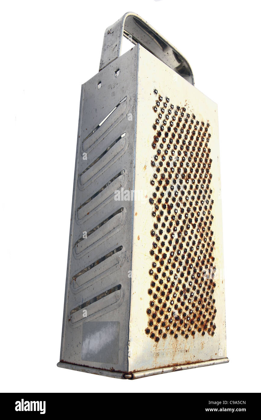 old metal vegetable grater,over white Stock Photo - Alamy
