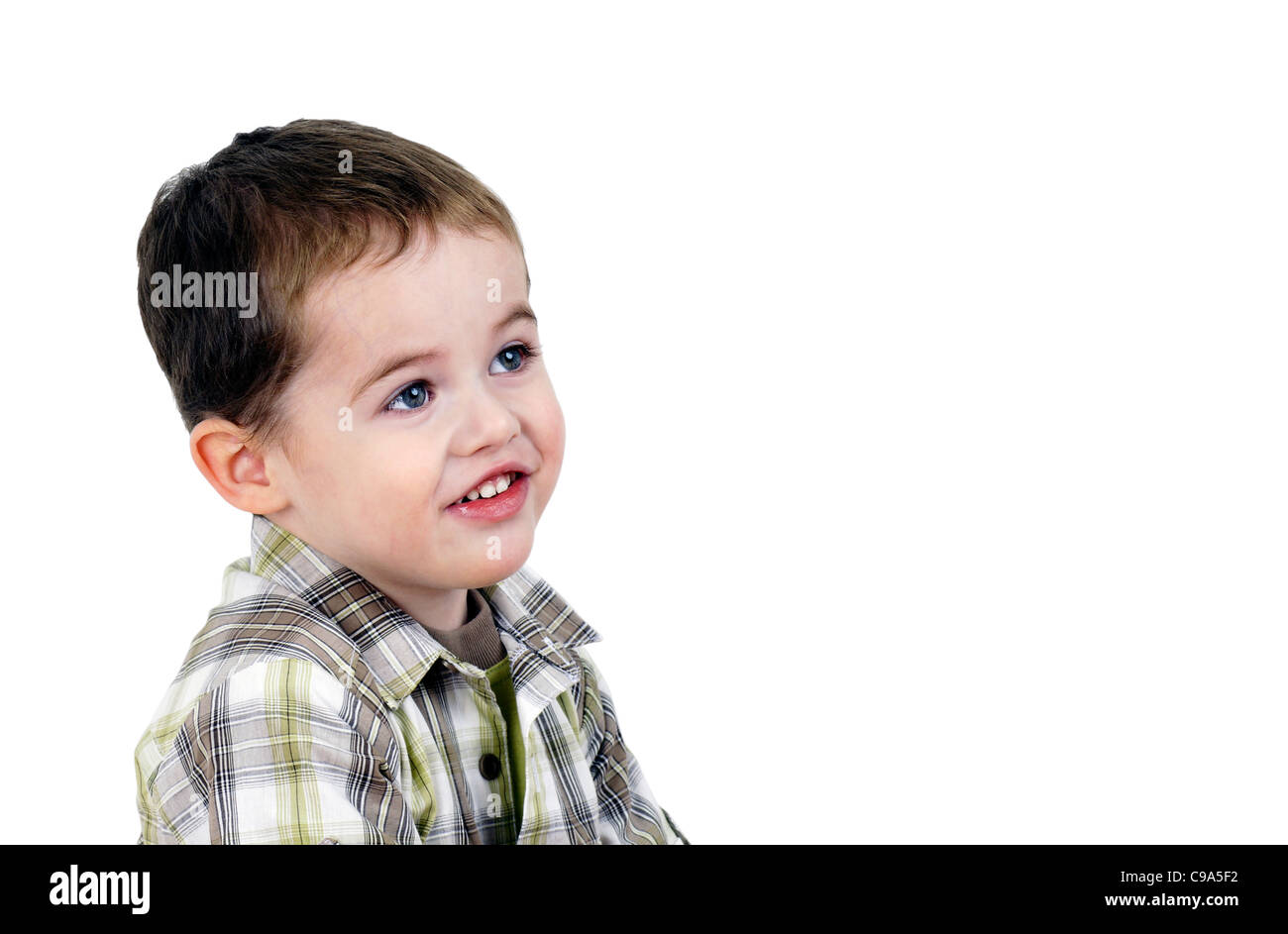 Studio shot of a very cute little boy toddler looking up isolated on ...