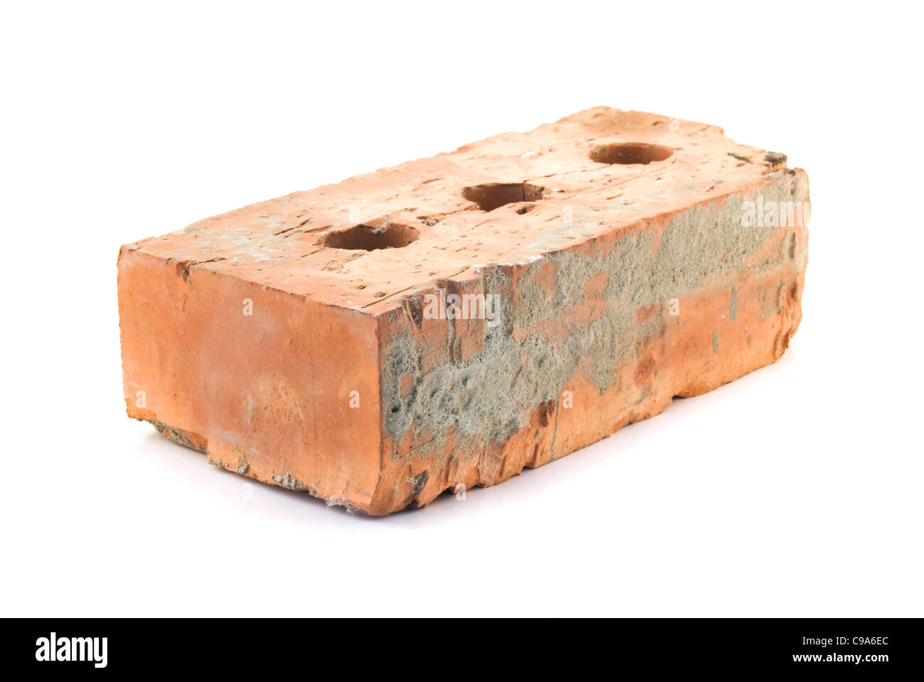 red solid brick on a white background Stock Photo - Alamy