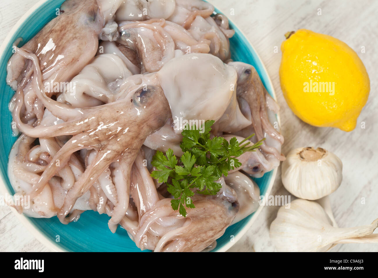 Fresh raw octopus ready to be cooked Stock Photo - Alamy