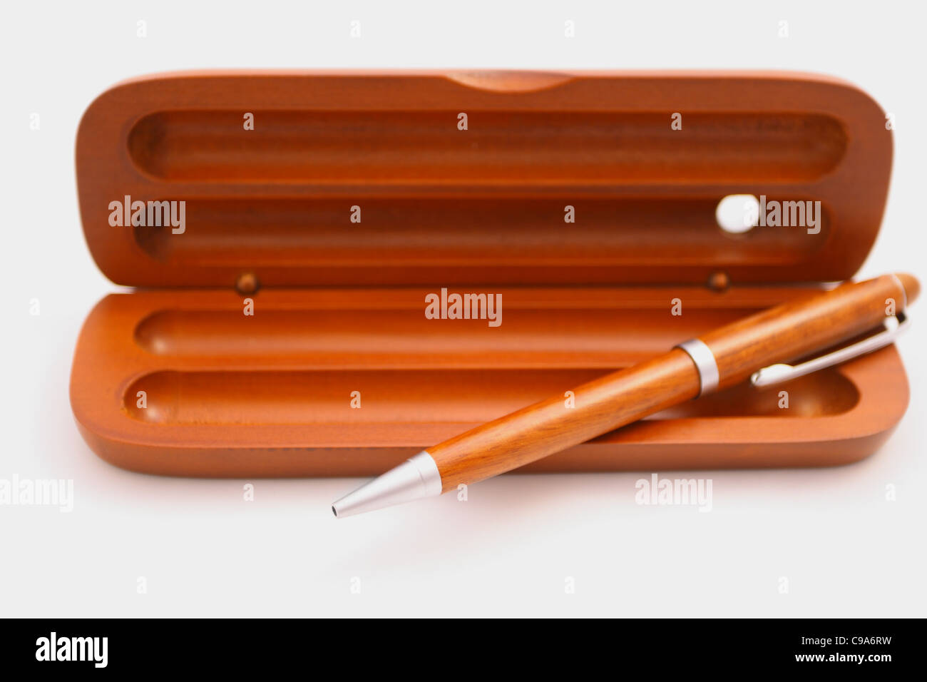 pen and box on the white background Stock Photo - Alamy