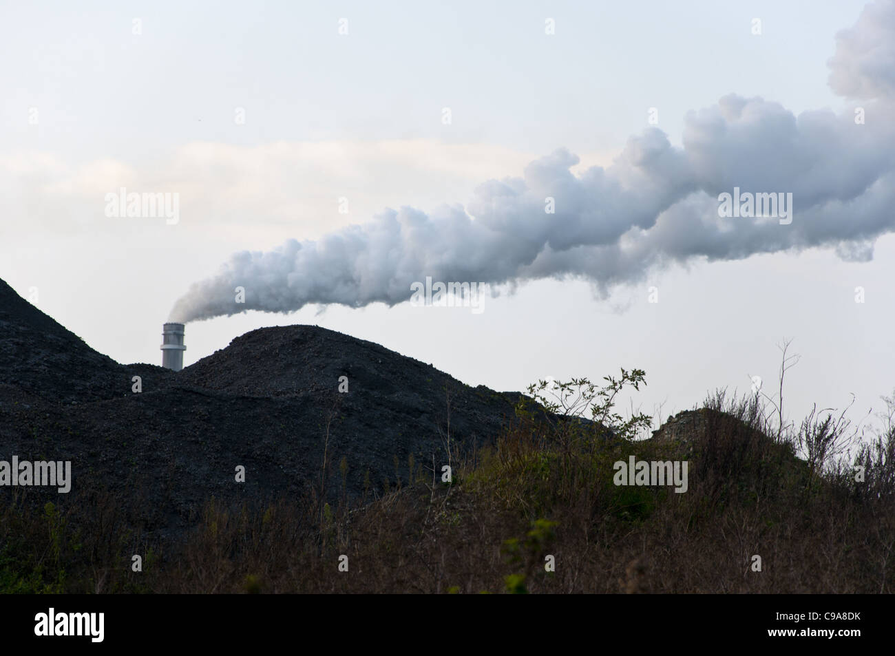 Industrial landscape chimney stack smoke Stock Photo - Alamy