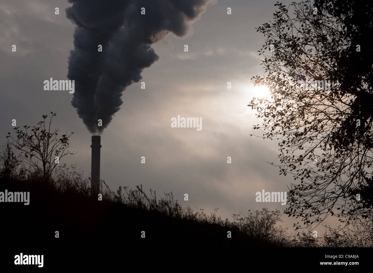 Industrial landscape chimney stack smoke Stock Photo - Alamy