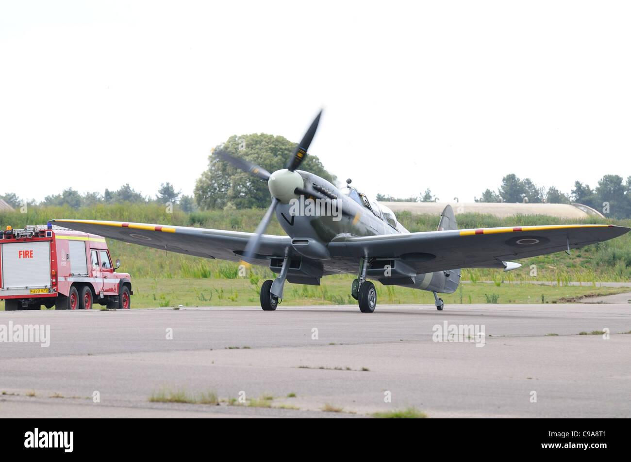 A Spitfire on the runway Stock Photo - Alamy