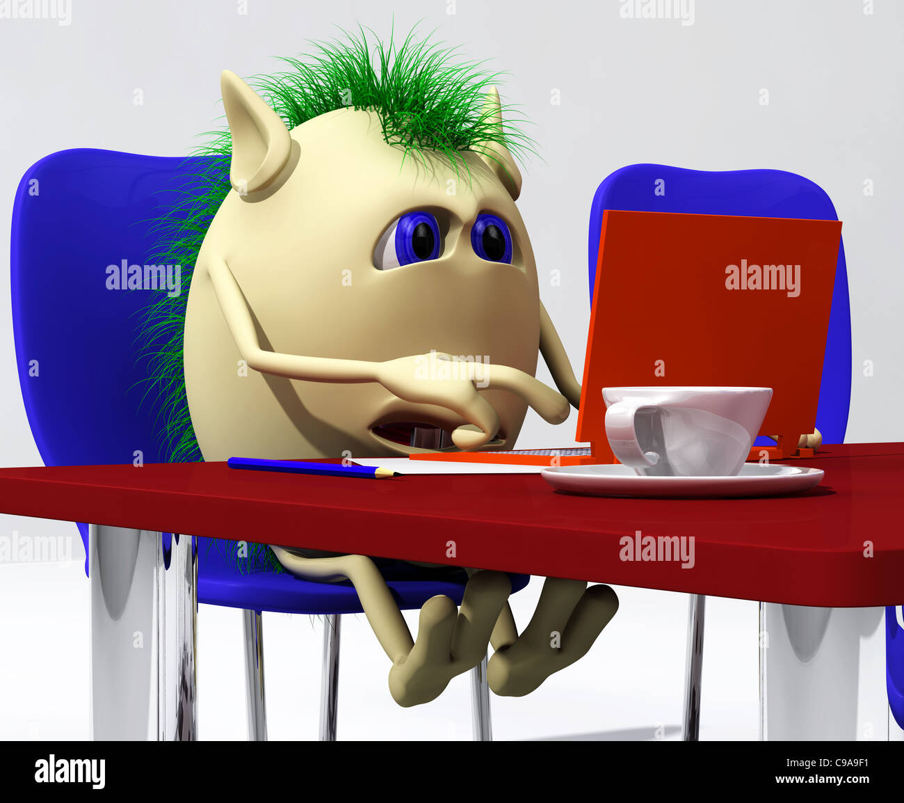 Puppet printing behind orange laptop on blue chair Stock Photo - Alamy